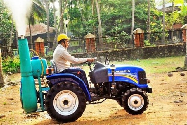 Tractor-Mounted Equipment to Spray Chemical Solutions on Affected Arecanut